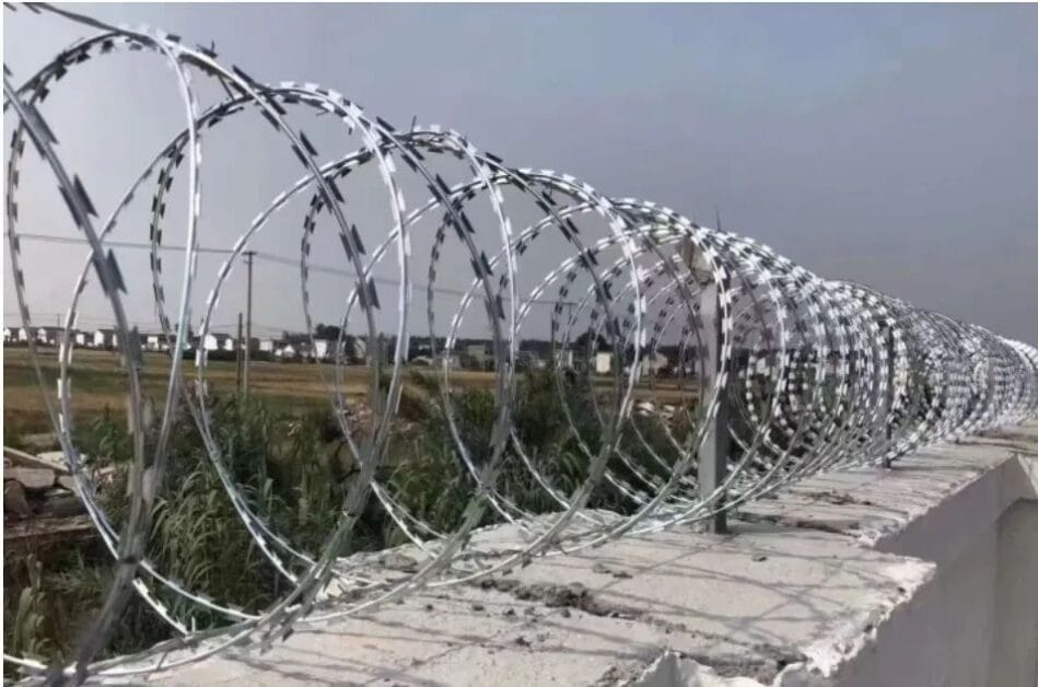 How to Build a Barbed Wire Fence (9 Steps)